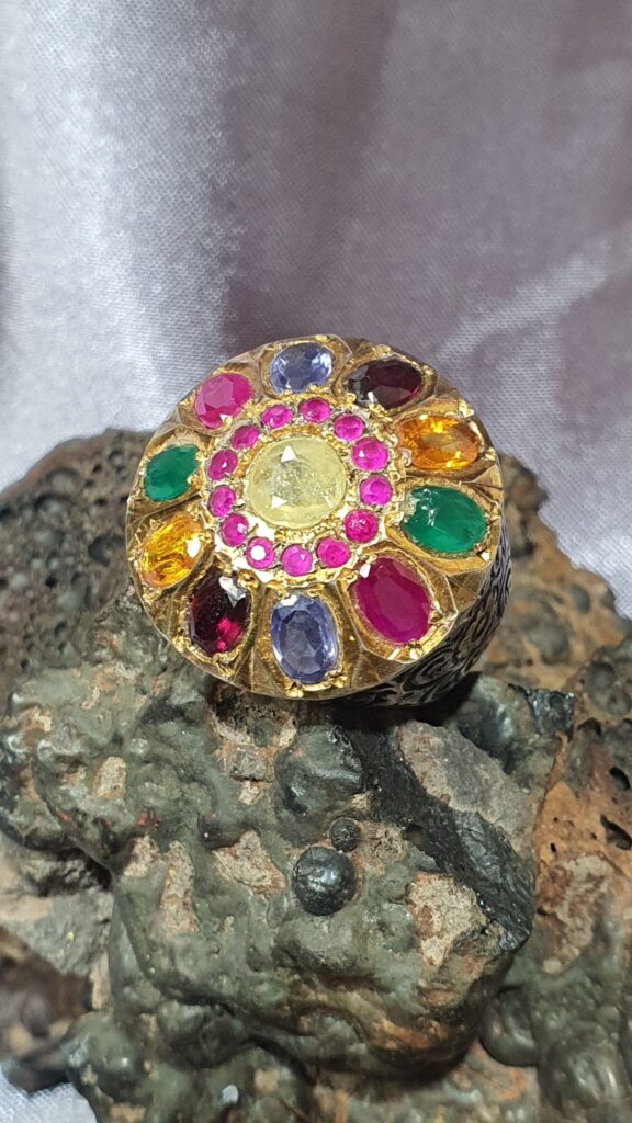 Yellow Sapphire, Blue Sapphire Ruby, Red Garnet, Emerald and Golden ...